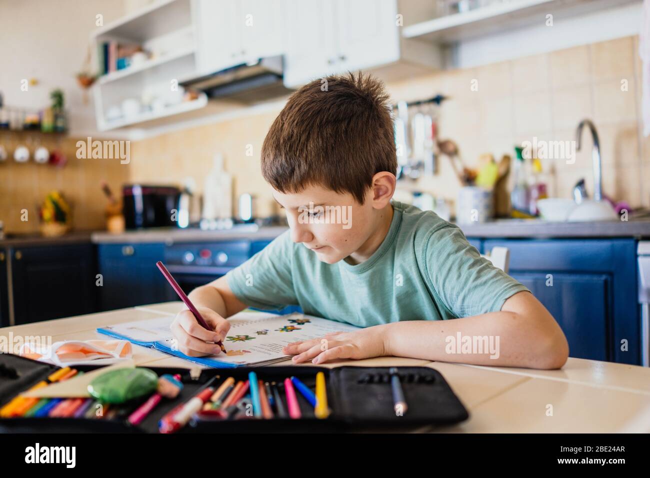 A boy learning at home Stock Photo - Alamy