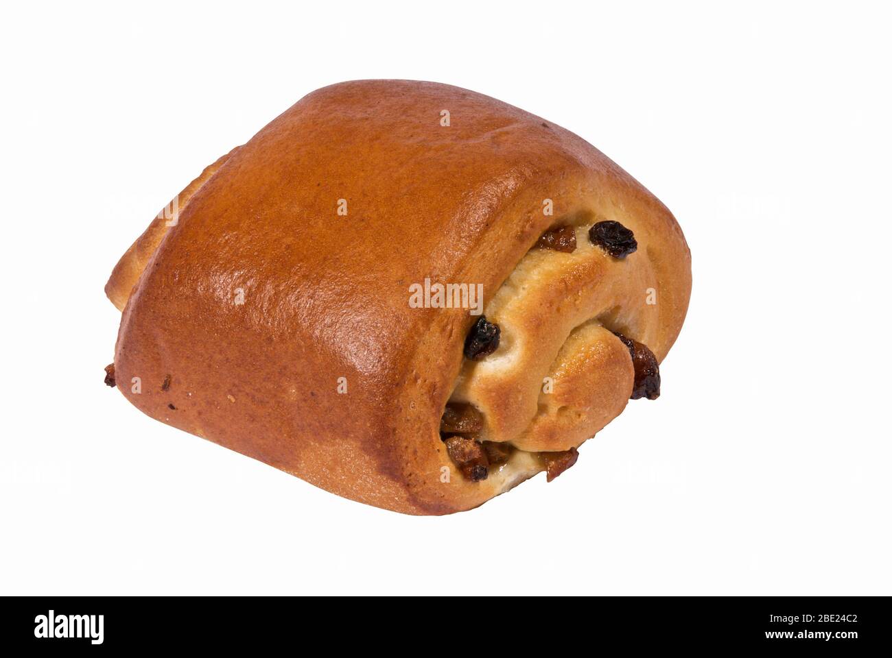 Baking sweet bun with raisins on a white background Stock Photo - Alamy