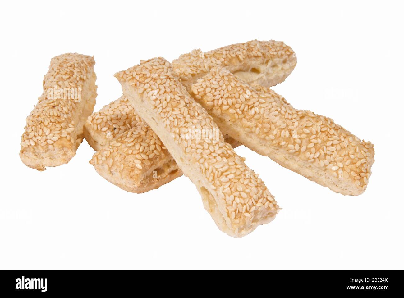 Baking puff pastry cookies on a white background Stock Photo - Alamy