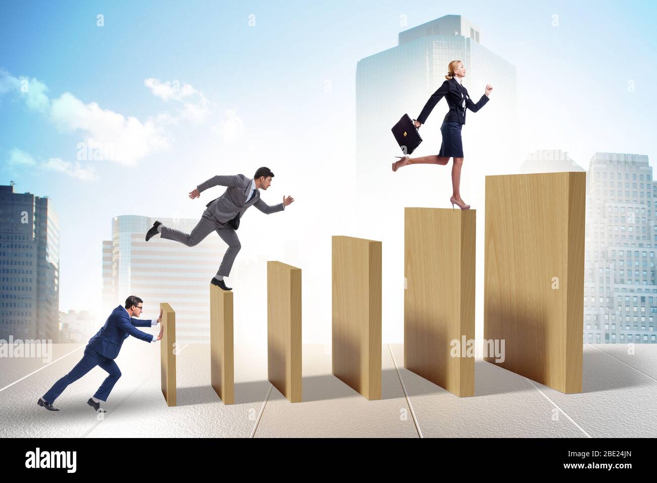 Domino effect and the competition concept Stock Photo - Alamy