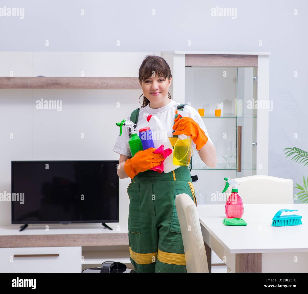 The professional cleaning contractor working at home Stock Photo - Alamy