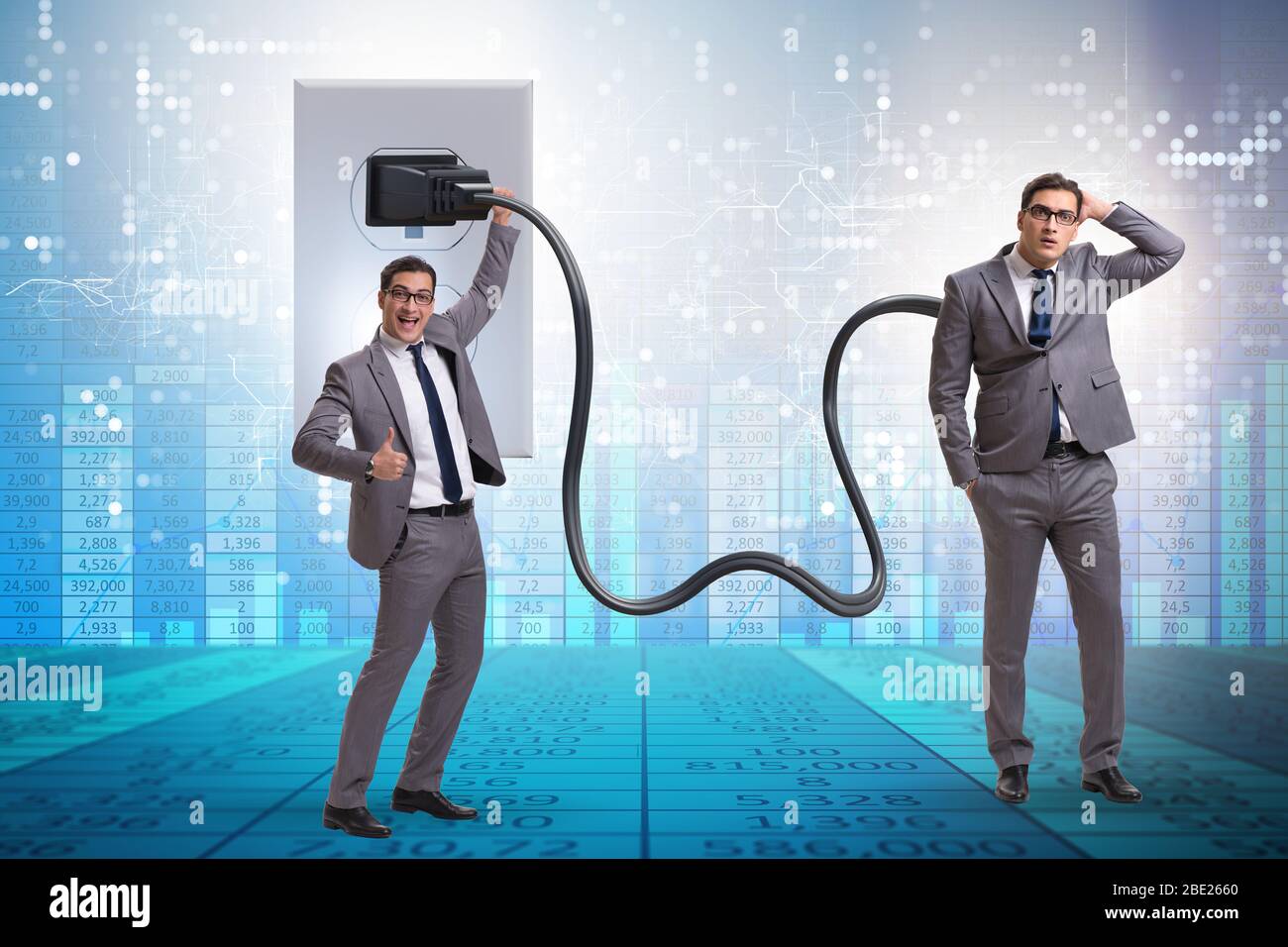 The businessman being powered by electricity and plug Stock Photo - Alamy