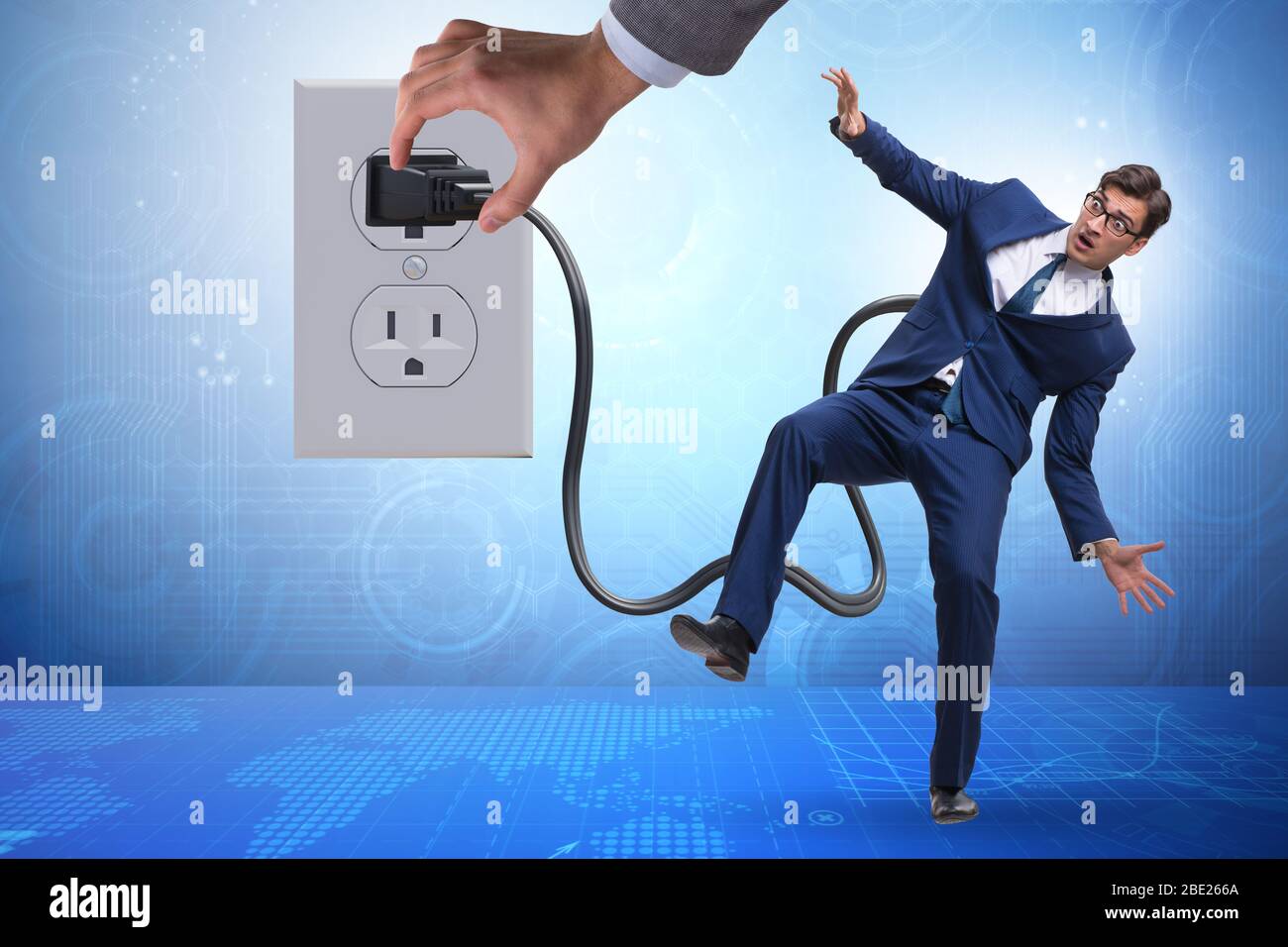 The businessman being powered by electricity and plug Stock Photo - Alamy