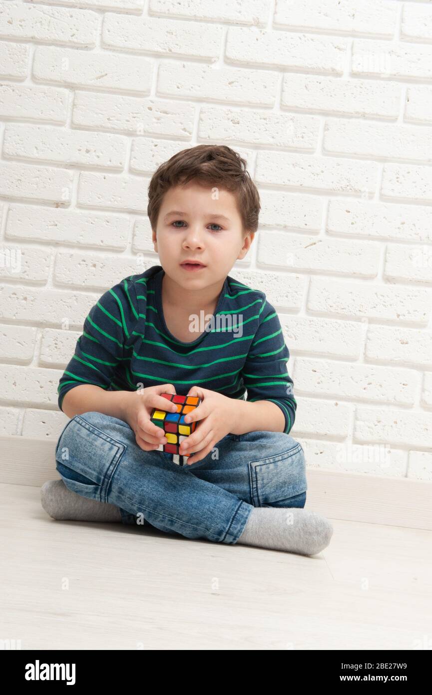 Kiev, Ukraine, 22 march 2020. boy plays with rubik's cube. Rubik's Cube ...