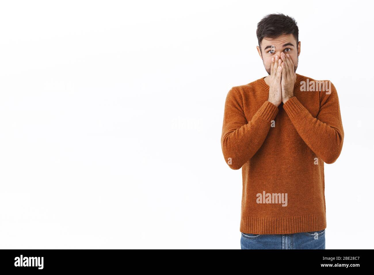 Portrait of shocked, speechless bearded caucasian man, gasping, cover ...