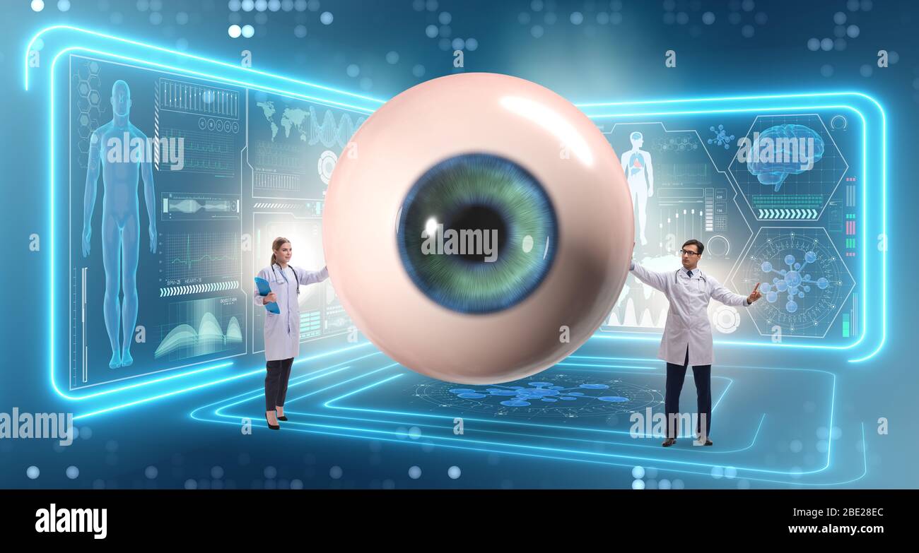 The doctor examining giant eye in medical concept Stock Photo - Alamy