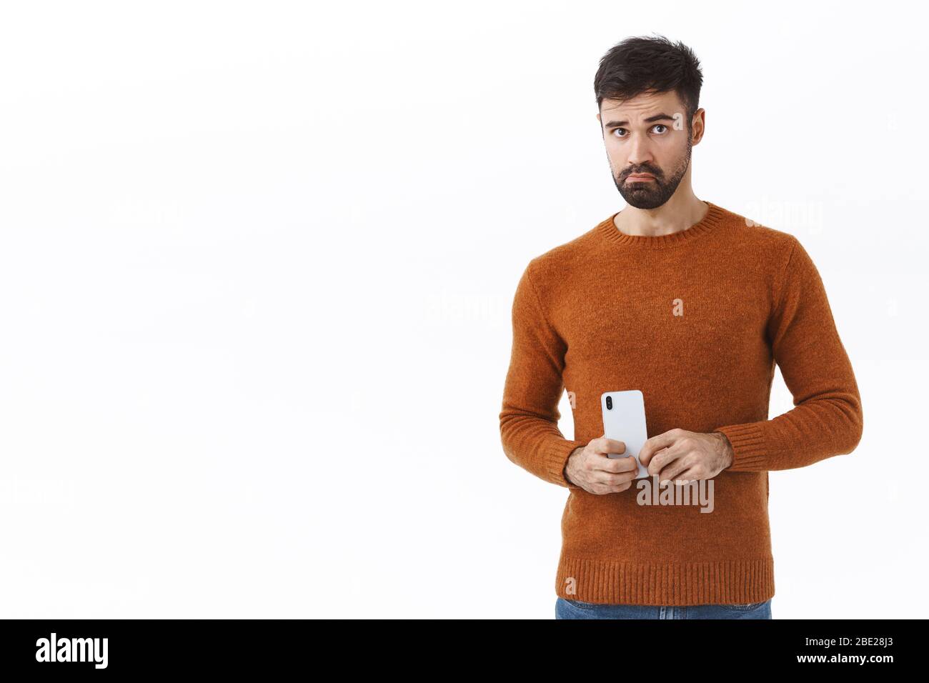 Holding phone to chest hi-res stock photography and images - Alamy