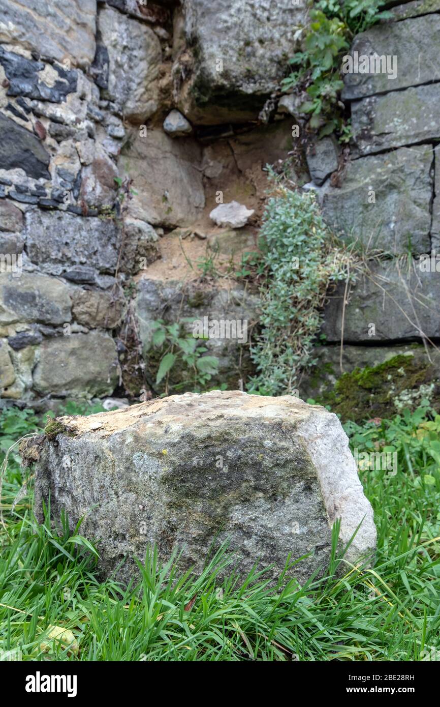 The fallen stone from fortification wall. Damaged old wall with fallen ...