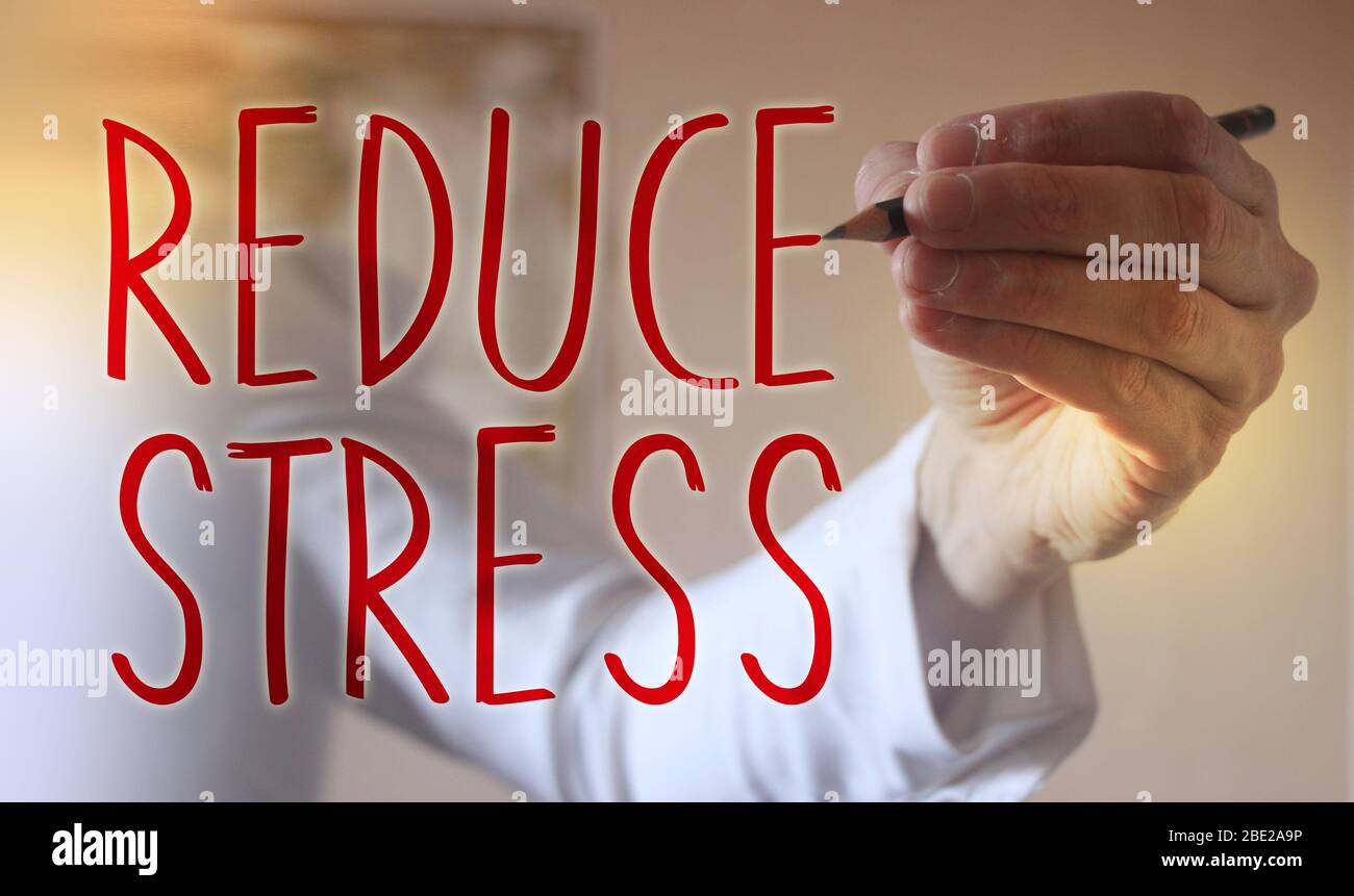 Doctor's hand writing words text Reduce Stress,,medical concept Stock ...