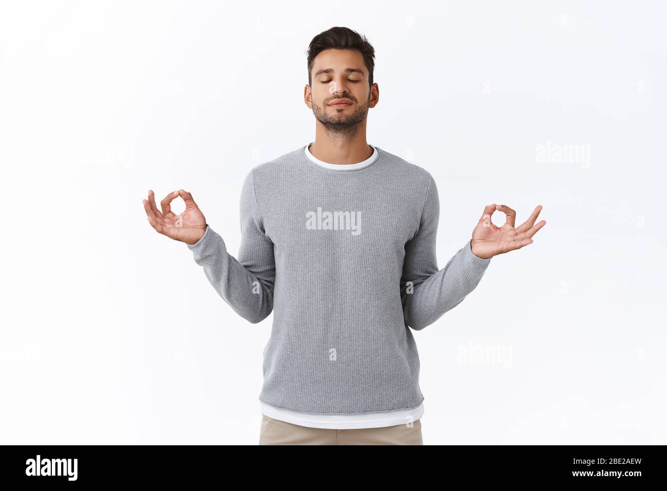Mindful patient and relaxed young happy man, practice breathing ...