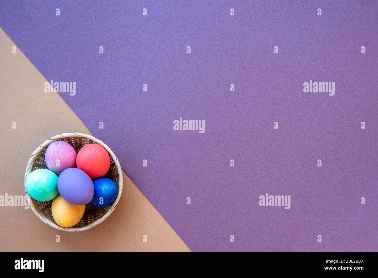 colorful easter eggs in a basket Stock Photo - Alamy