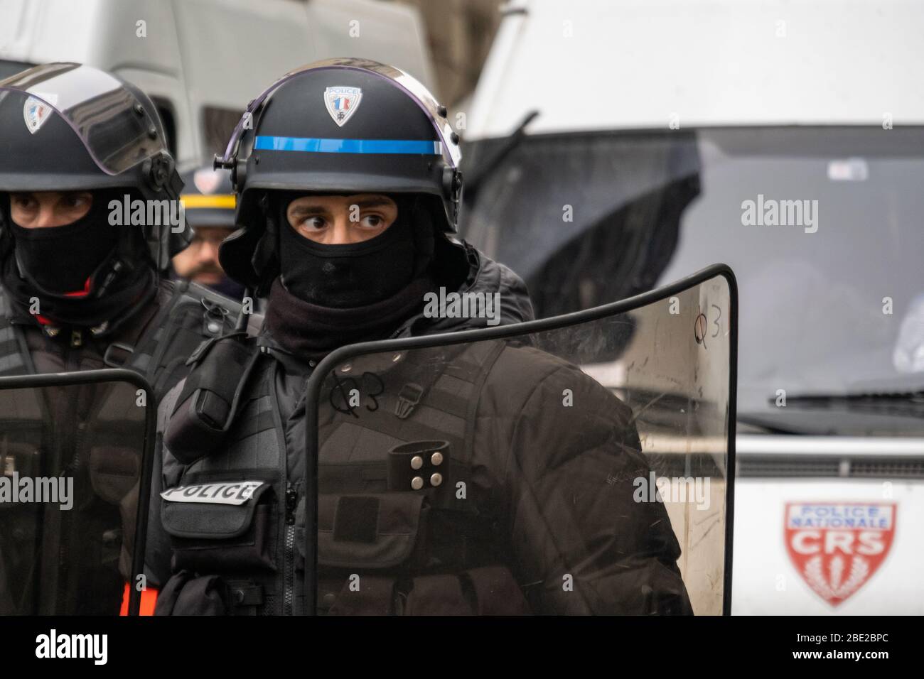A riot policeman in full gear prepares to breakup protests during the ...