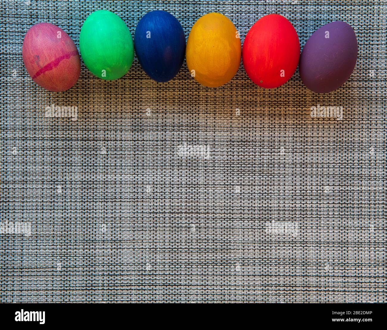 colorful easter eggs in a basket Stock Photo - Alamy