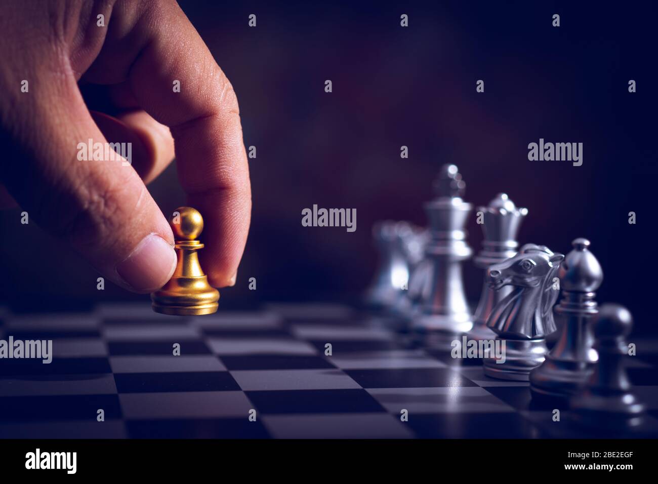 hand move back rank of chess boad game to practice planing and stratagy ...