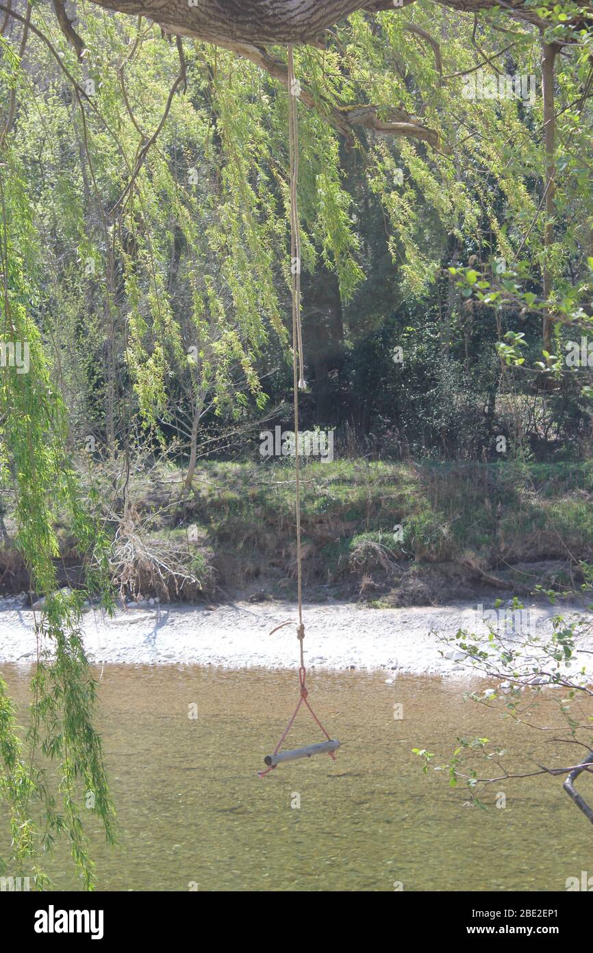 River bank rope swing hi-res stock photography and images - Alamy