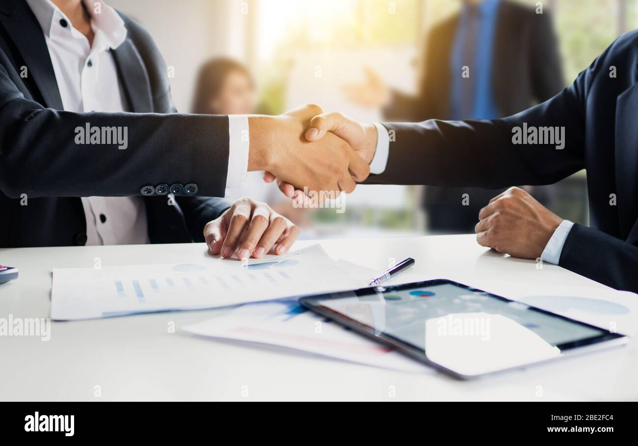Business people making handshake, successful negotiation and agreement ...