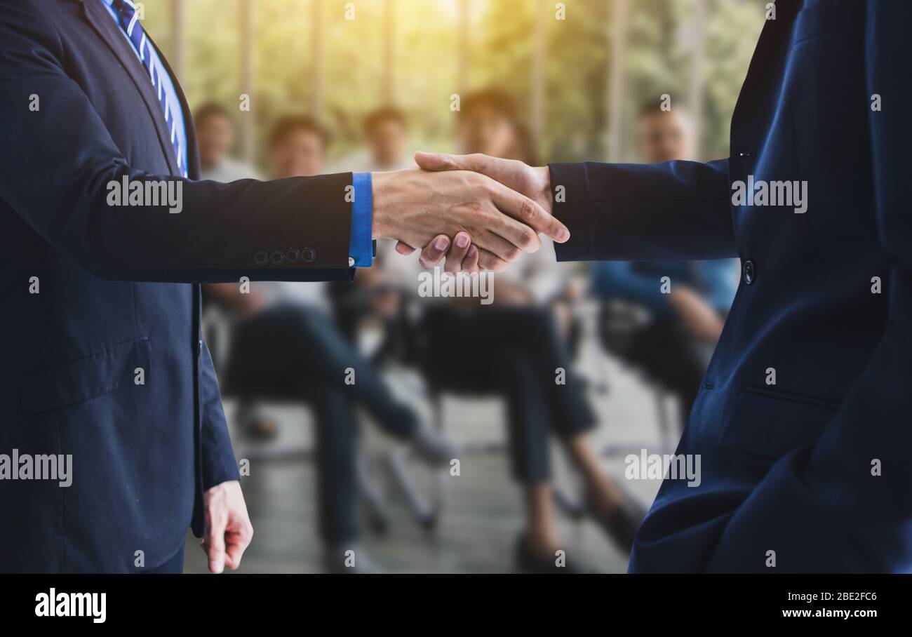 Business people making handshake, successful negotiation and agreement ...