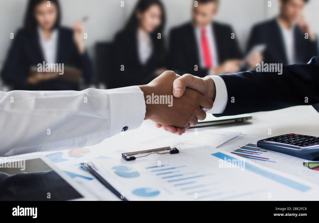Business people making handshake, successful negotiation and agreement ...