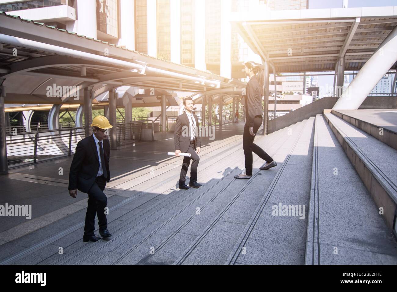 officer and business people walking on stair to office Stock Photo - Alamy