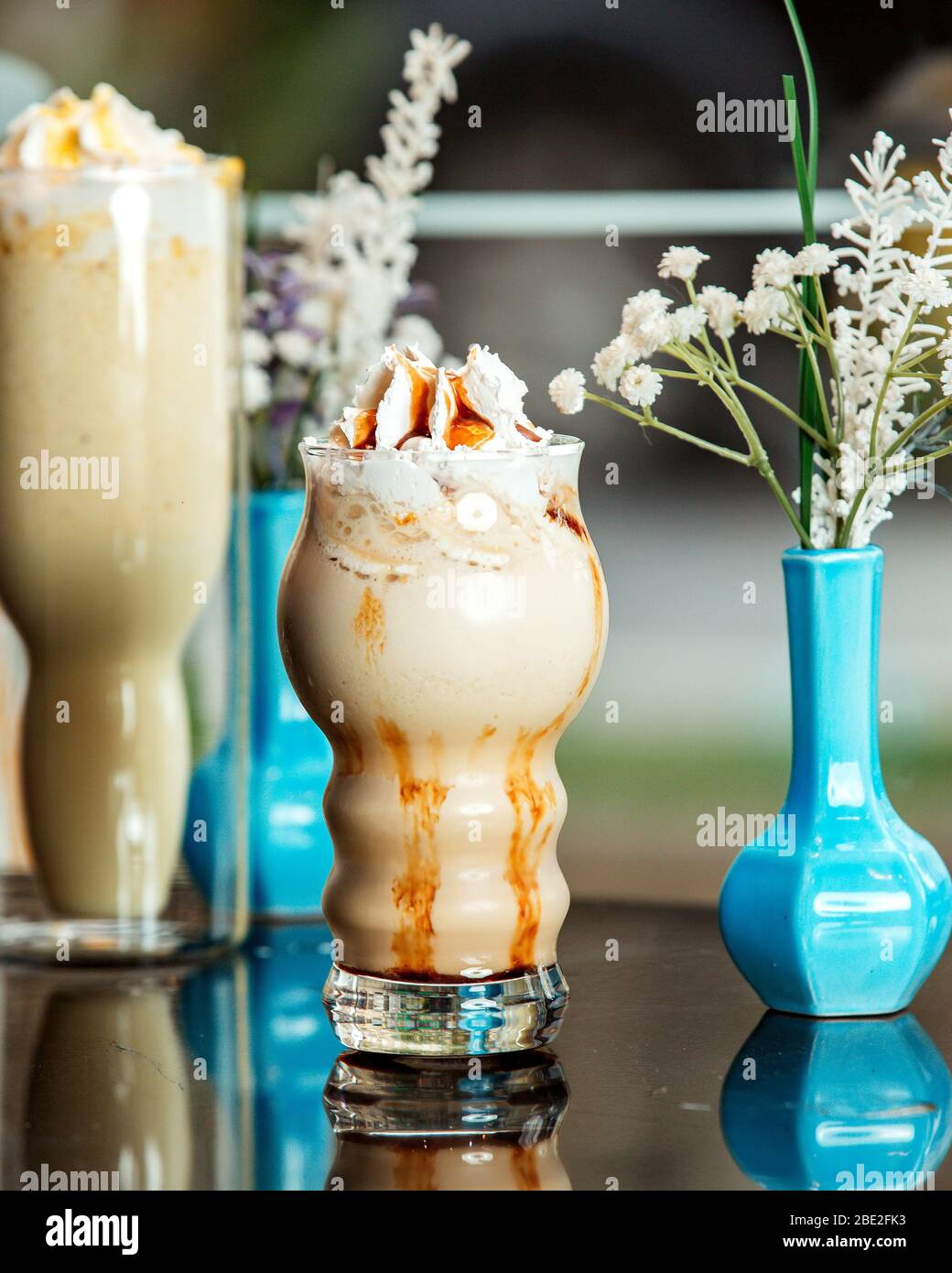 frappe in a glass with caramel topping Stock Photo - Alamy