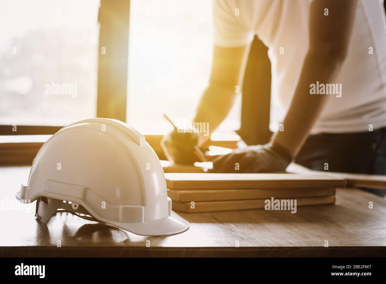 engineer working in office, writing and planing construction building ...