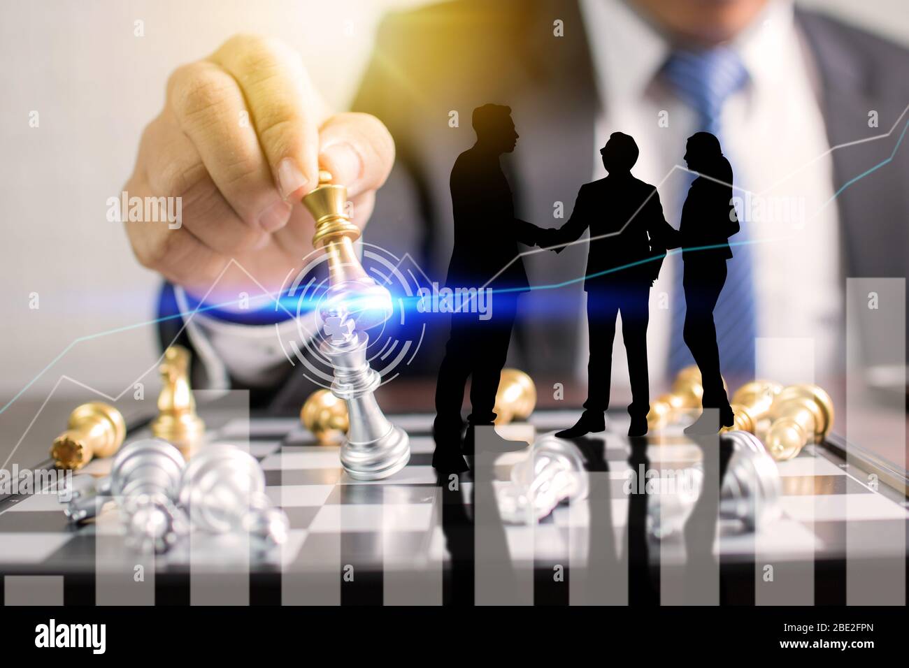 business man holding chess fighting, planning concept with silhouette ...