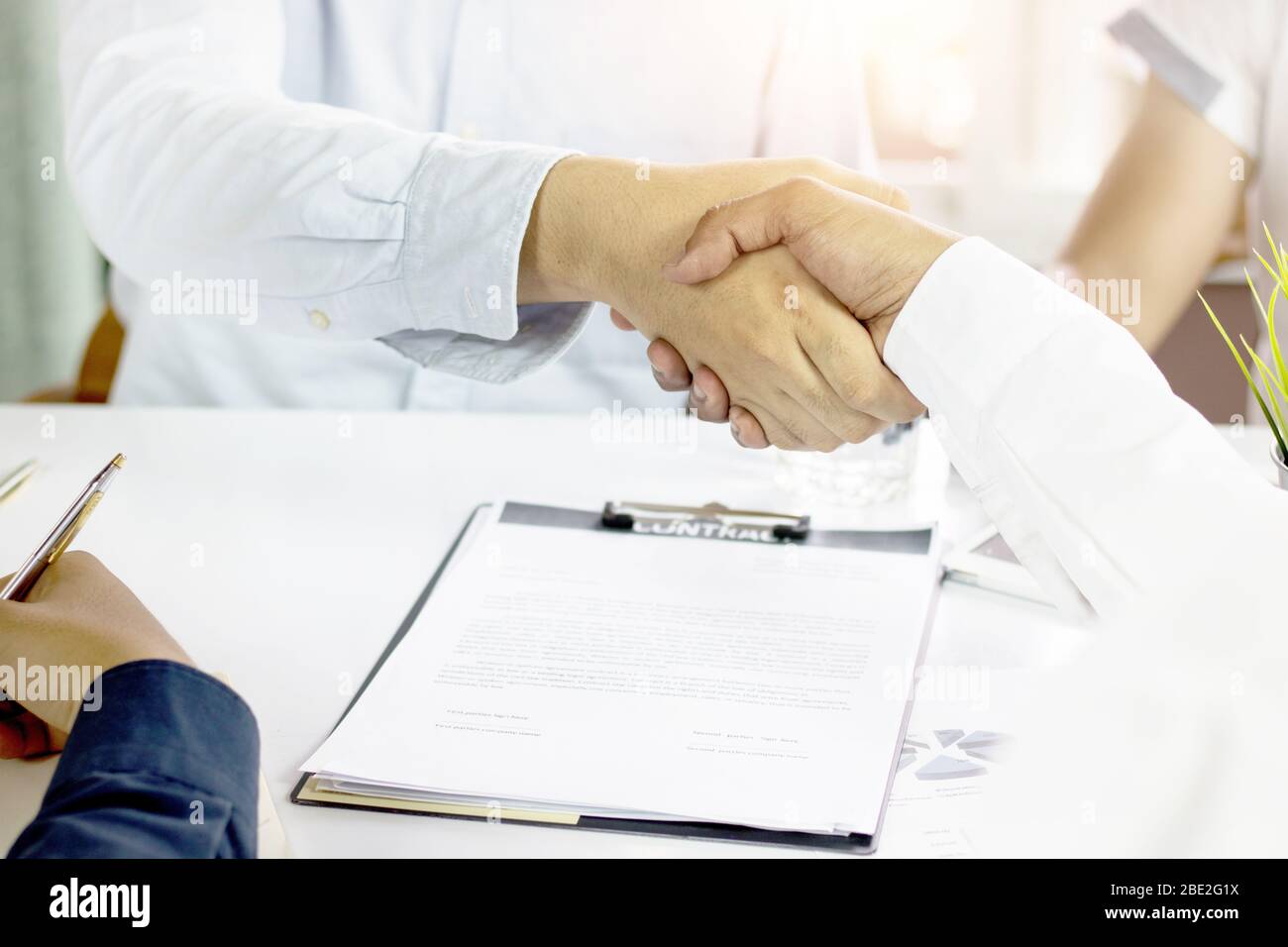 Business people making handshake, successful negotiation and agreement ...