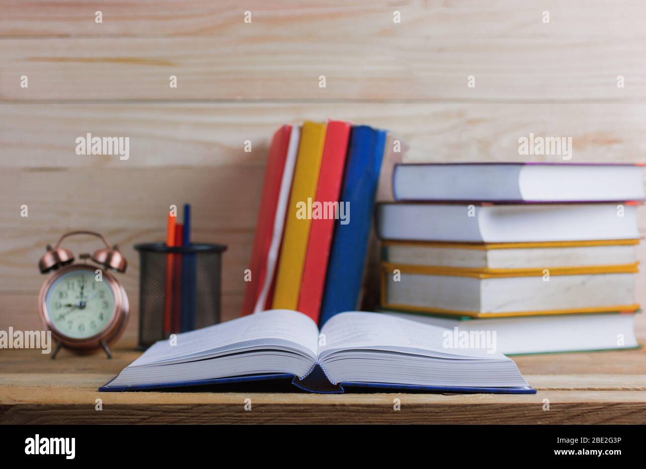 open book on desk, knowledge and education concept Stock Photo - Alamy
