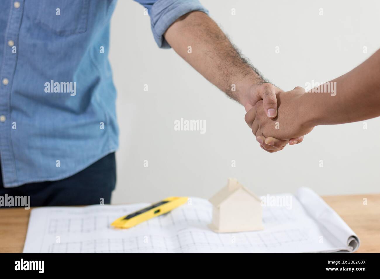 White asian man hand shake hi-res stock photography and images - Alamy