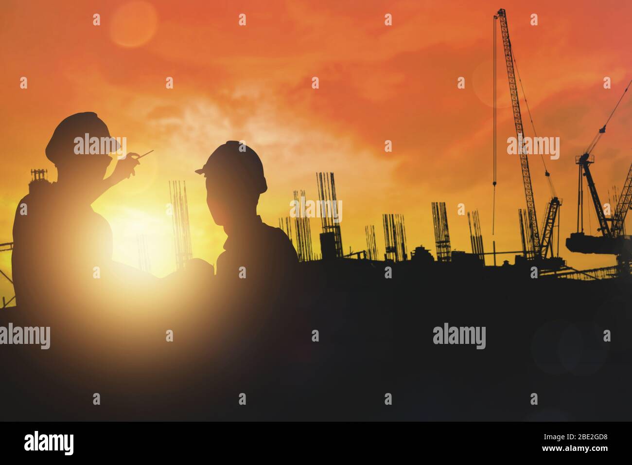 sillouette of engineer and building contractor group planning and ...