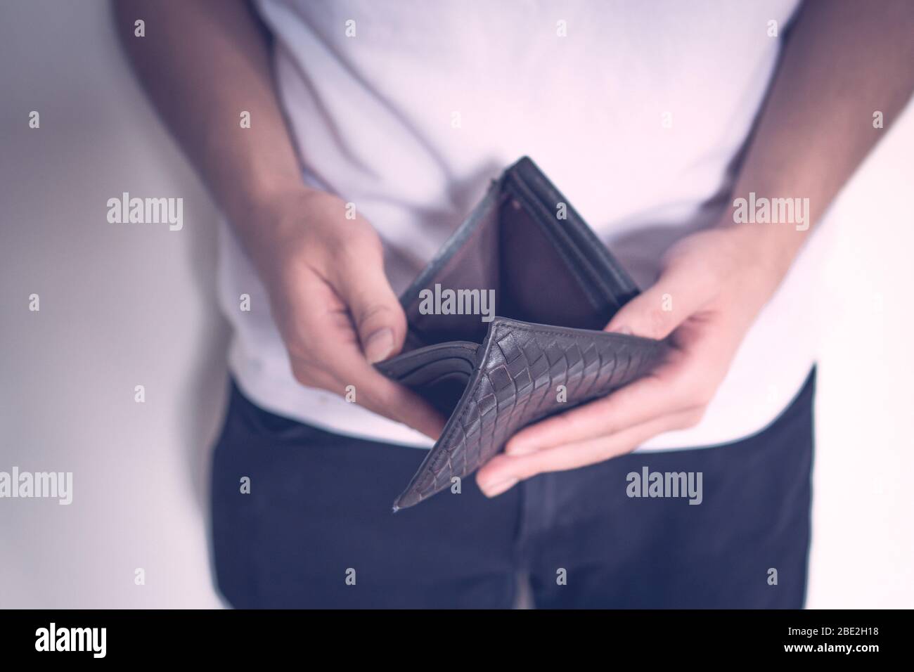 no money in wallet, man open purse and don't any bank note, poor and ...