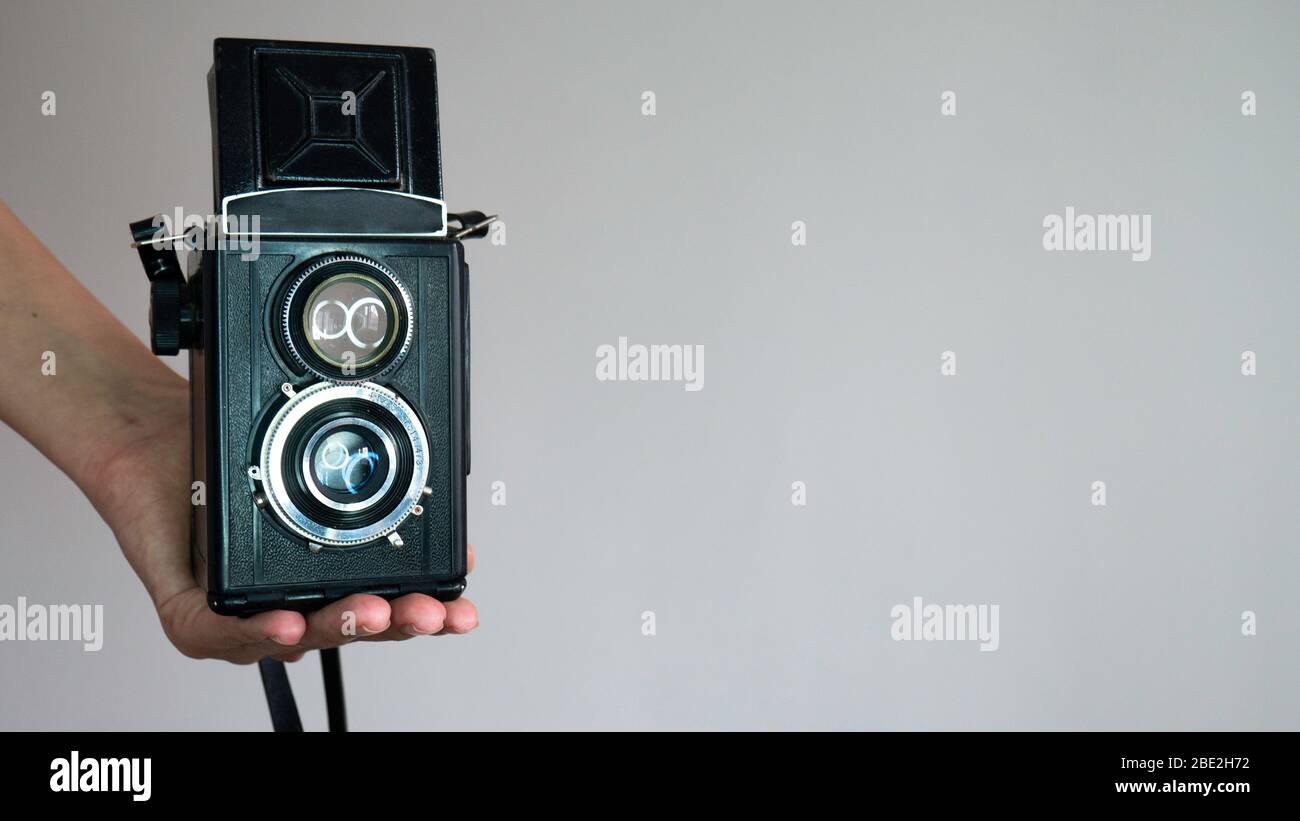 Vintage two lens photo camera isolated on white background. Negative ...