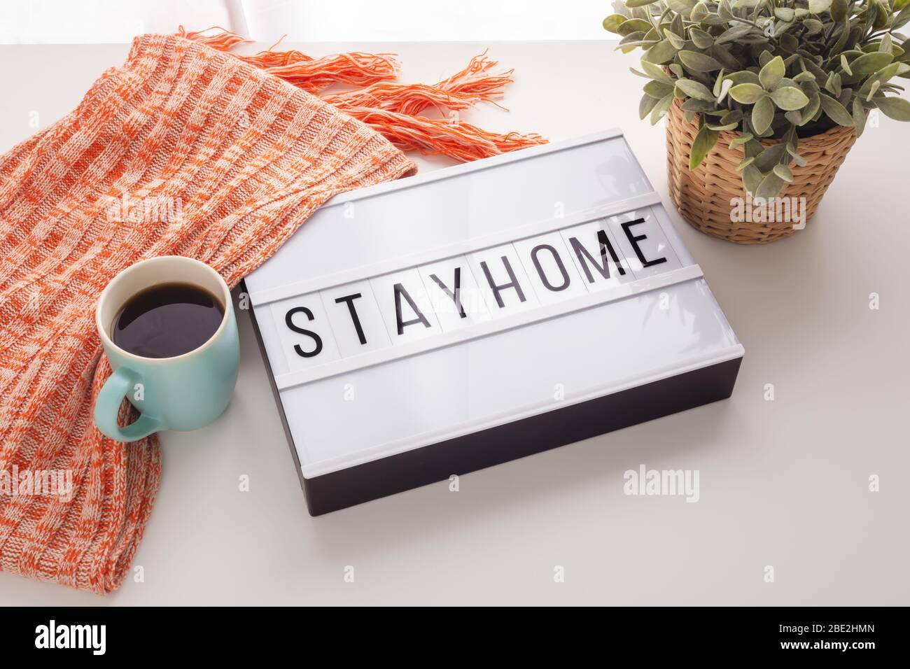 Stay home word on lightbox protection from coronavirus or covid-19 Stock Photo - Alamy