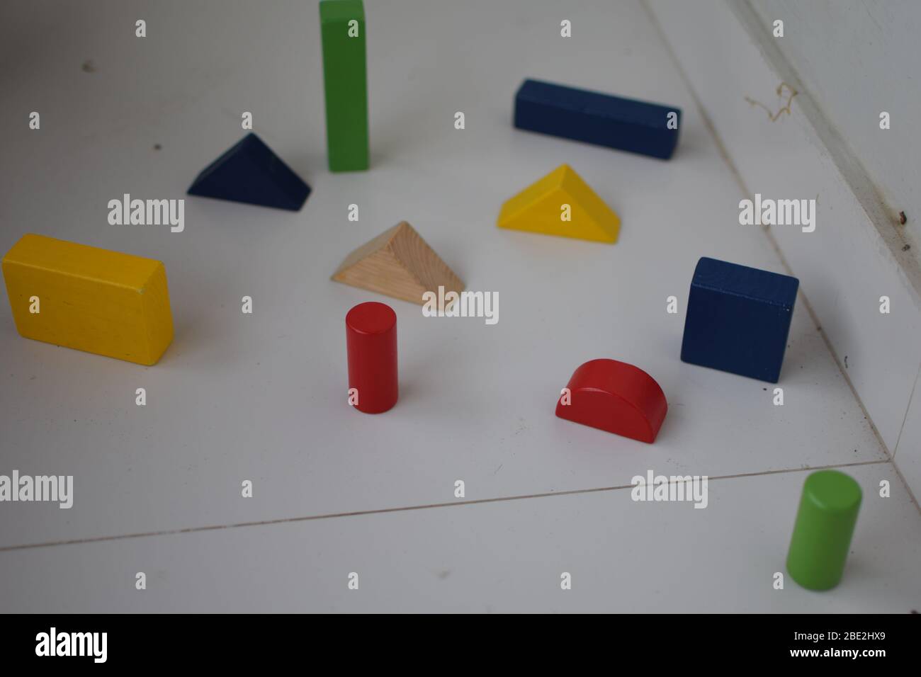 multi shaped blocks lying on the floor Stock Photo - Alamy
