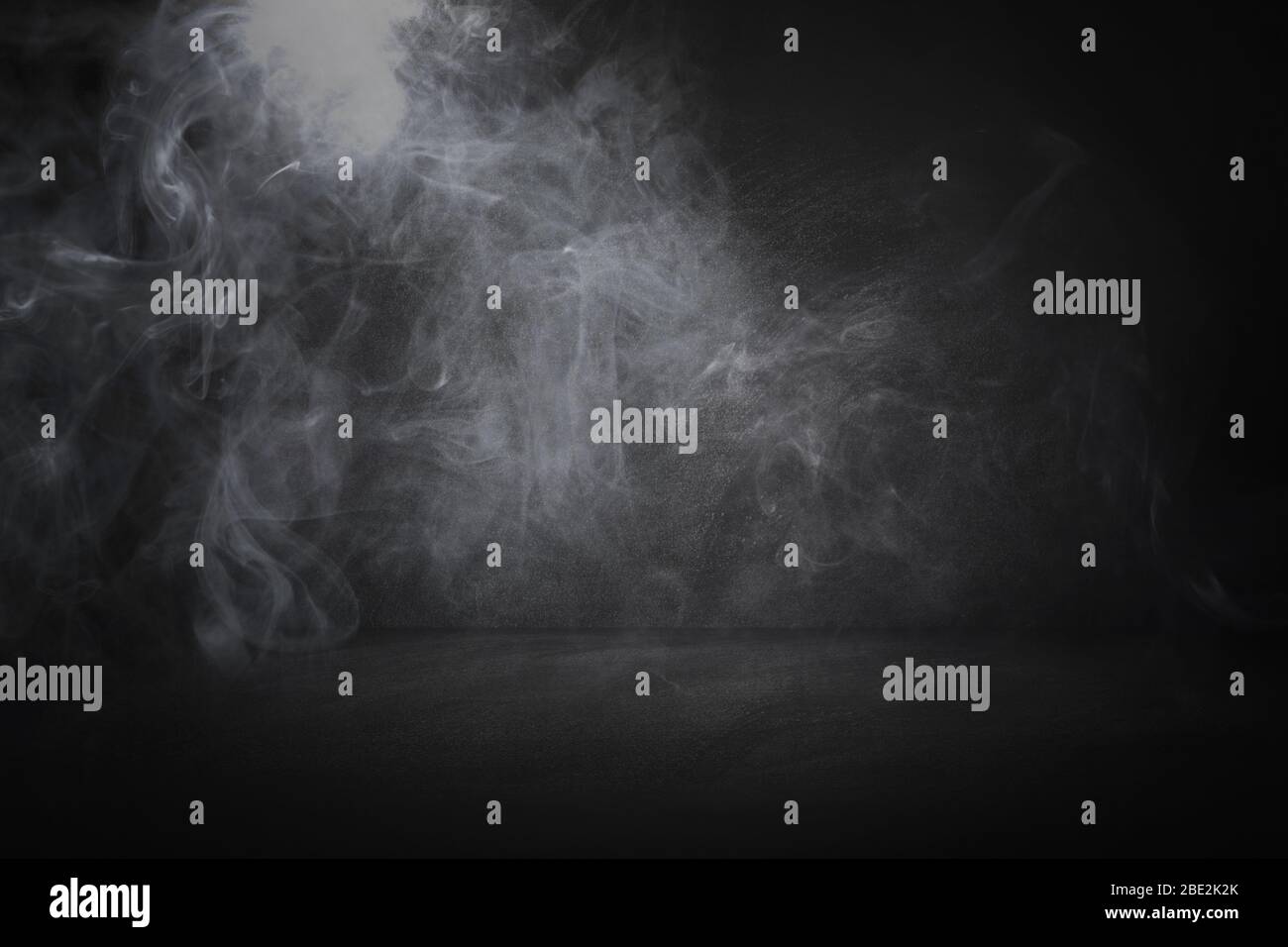 black and chalkboard studio and interior background with mist or fog ...