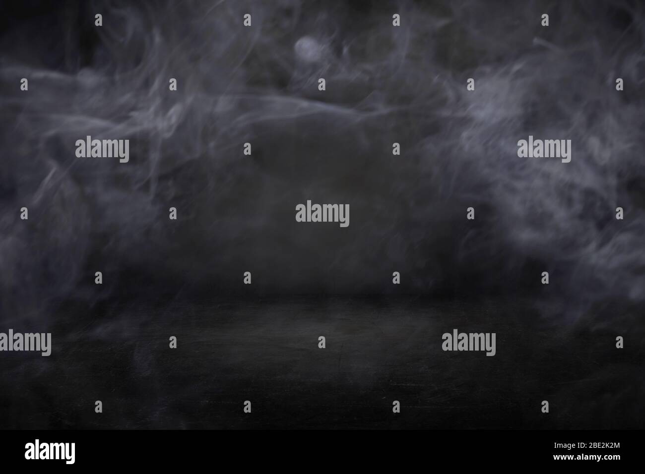 black and chalkboard studio and interior background with mist or fog ...