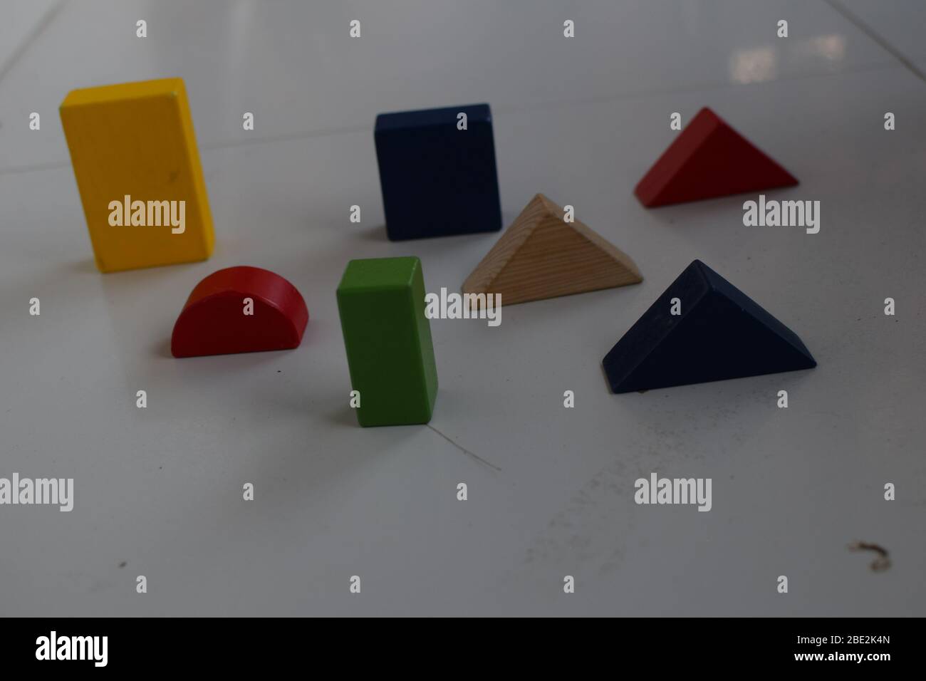 multi shaped blocks lying on the floor Stock Photo - Alamy