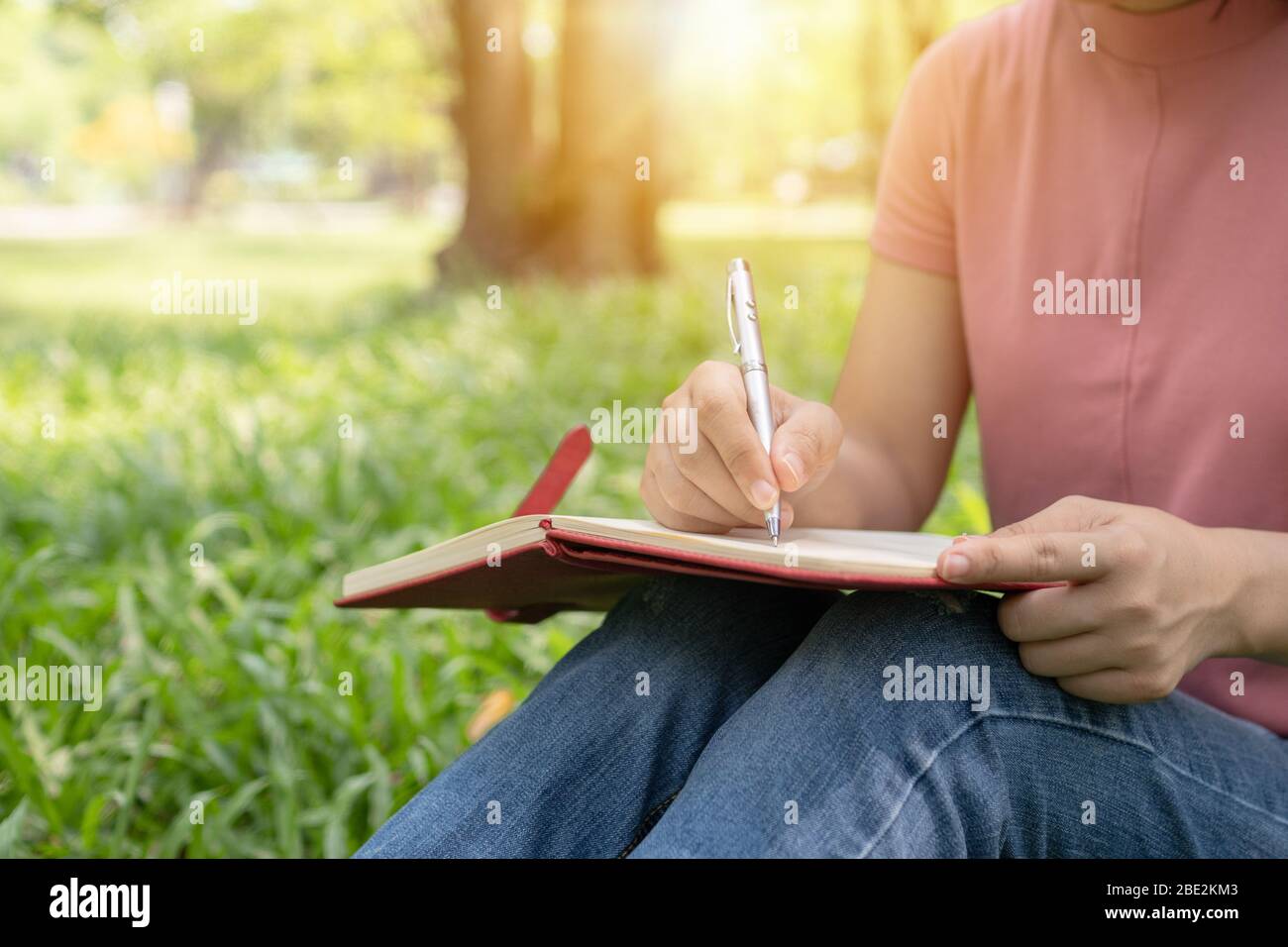 poem, poetry and knowledge education concept, close up sitting writing ...
