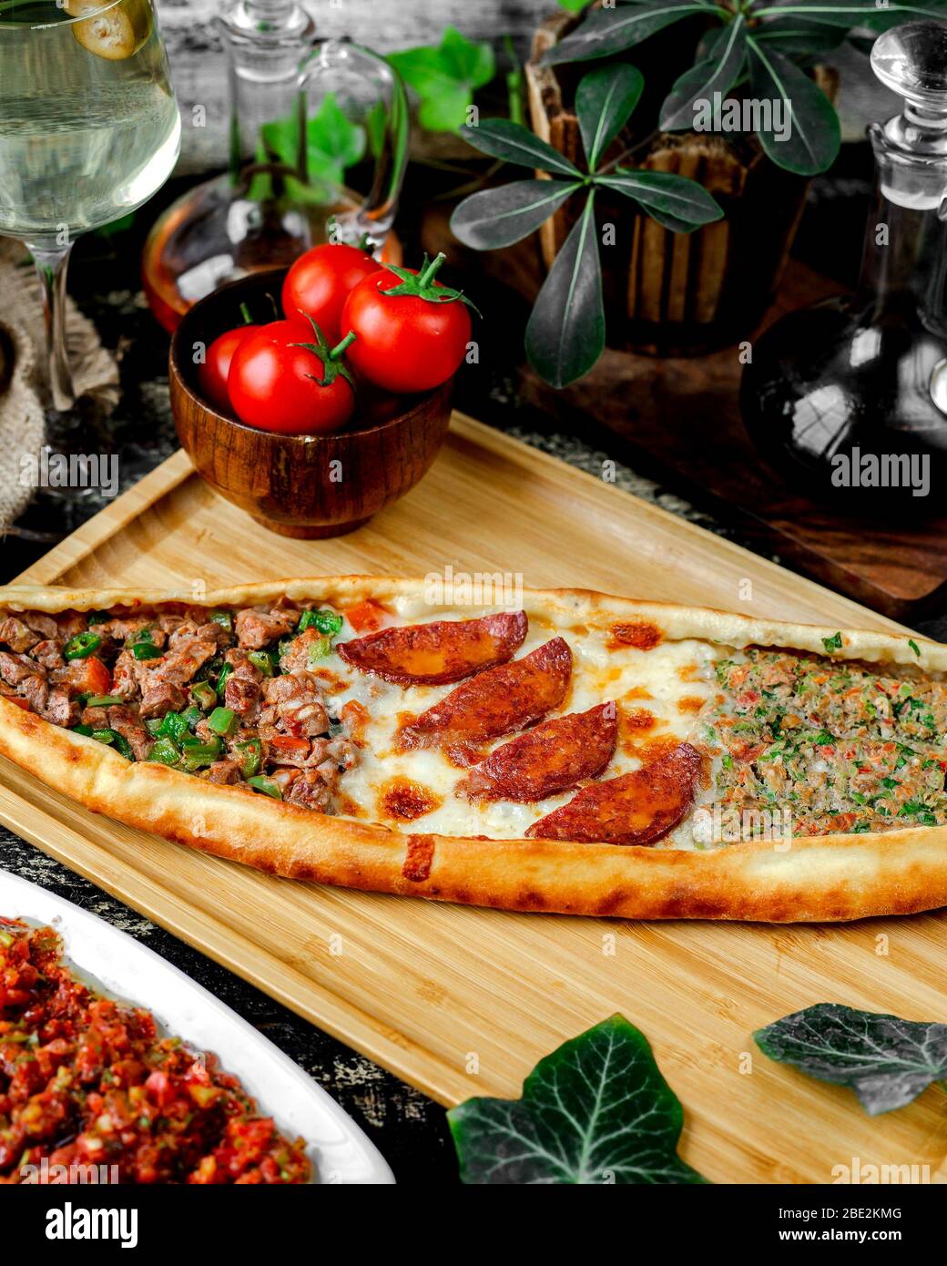 pide with meat sausage pepper and cheese Stock Photo - Alamy