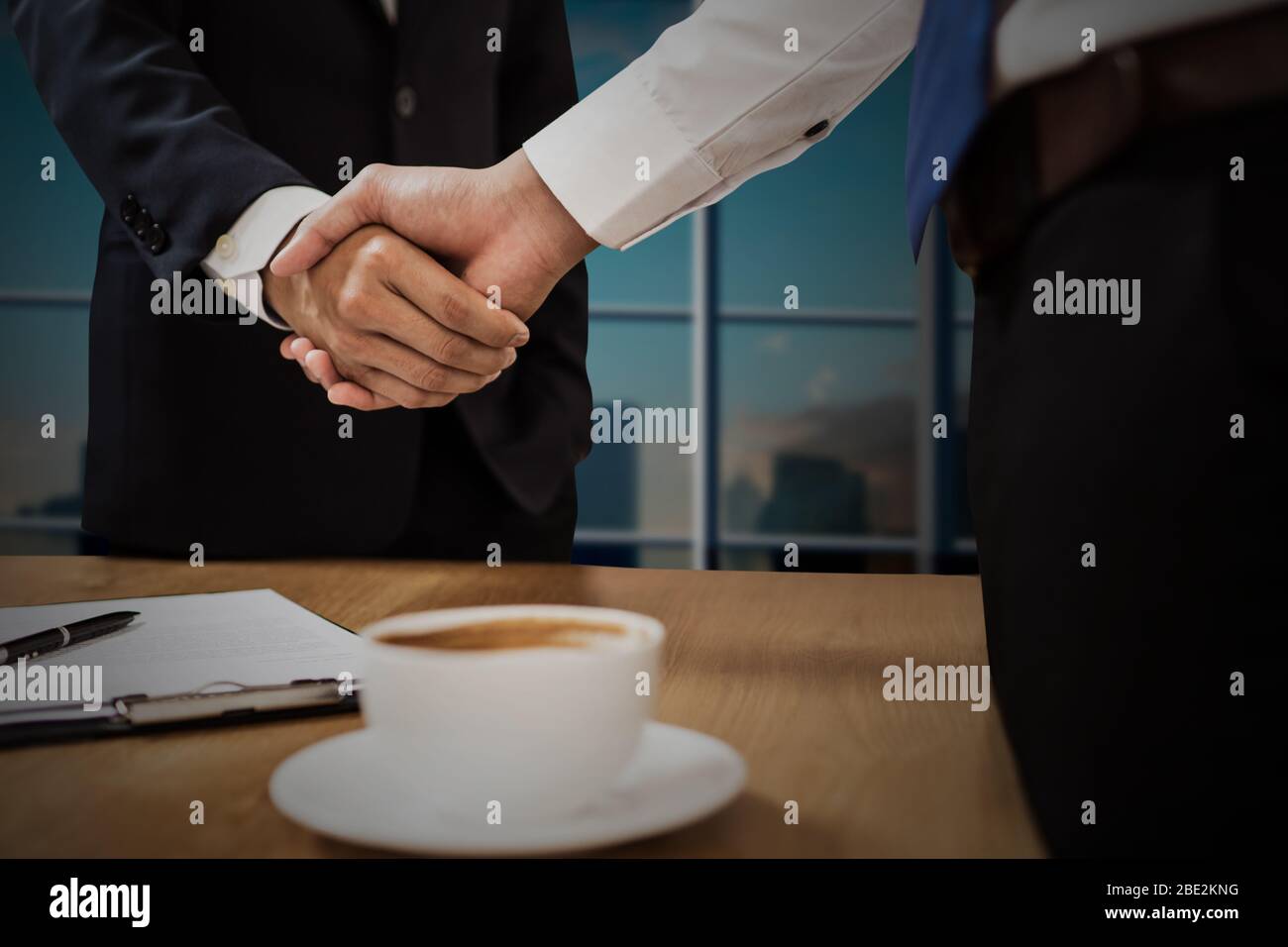 successful cooperation and confident partner concept, people shake ...