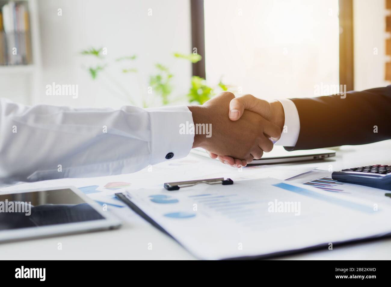 business people negotiate and shake hands with investor partner after ...