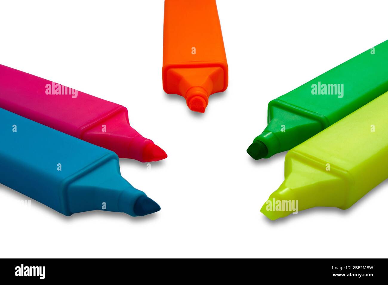 Five different colour highlighter pens arranged on an isolated white ...