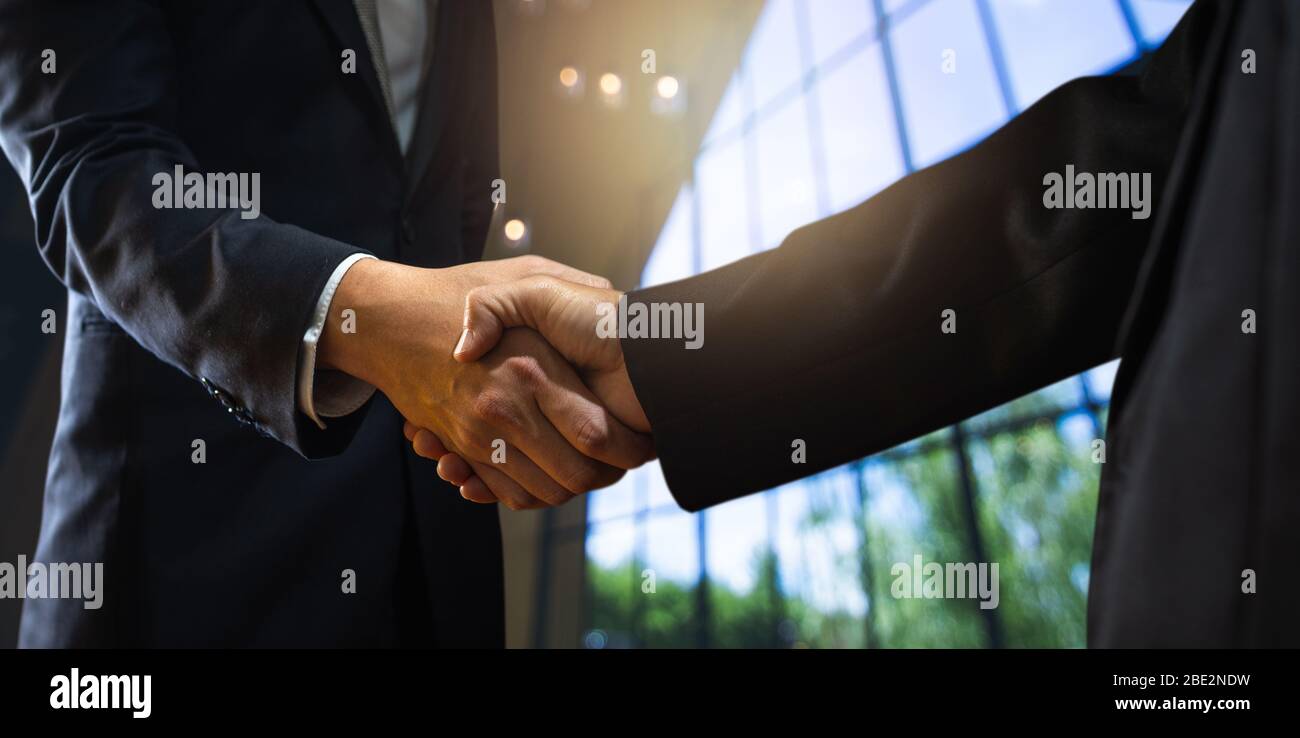 successful negotiate and handshake concept, two businessman shake hand ...