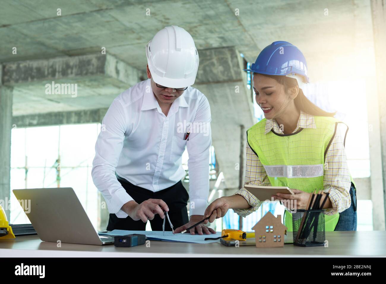 professional engineer planning with team young architect with laptop on ...