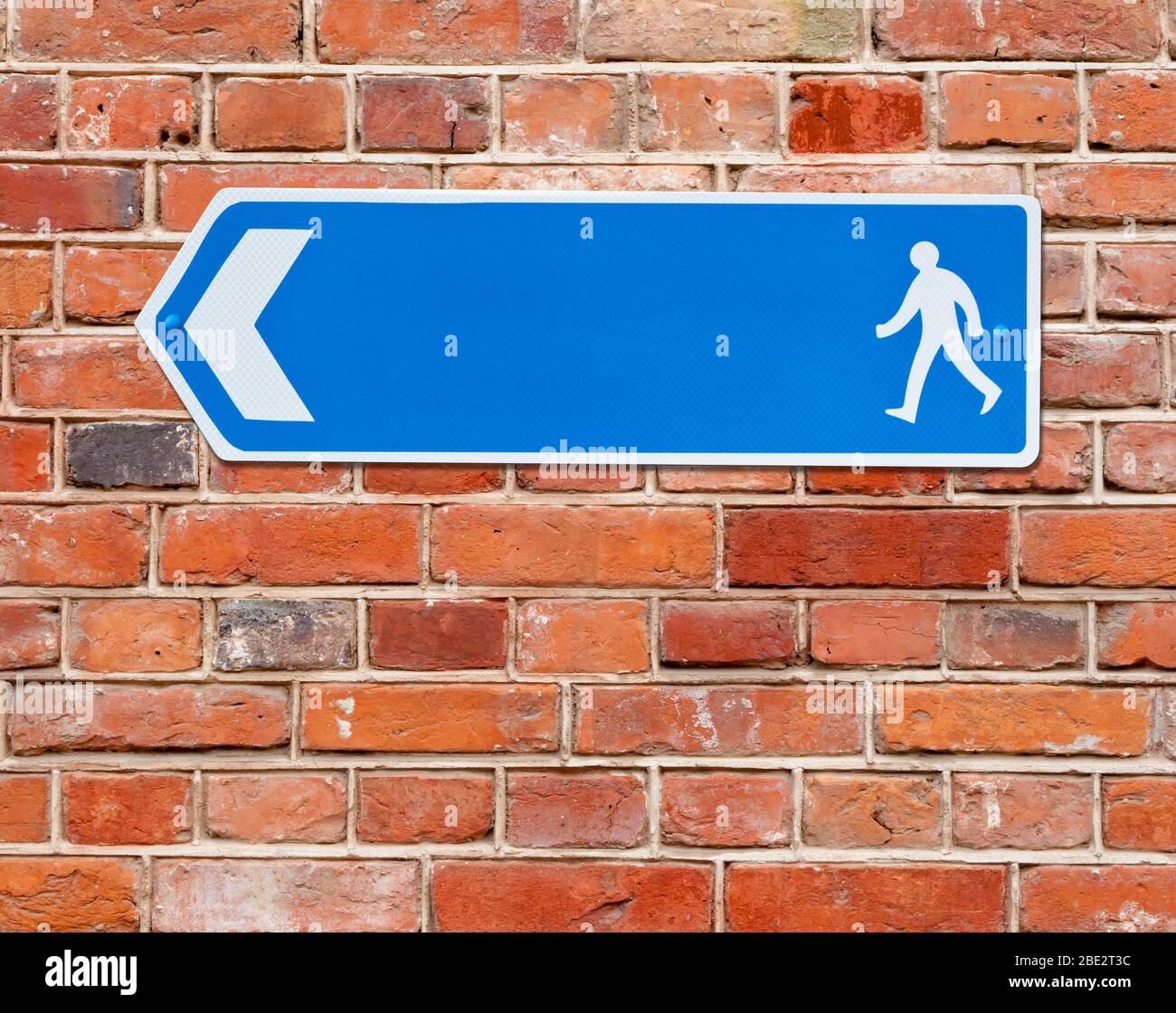 An image of a blue arrow road sign Stock Photo - Alamy