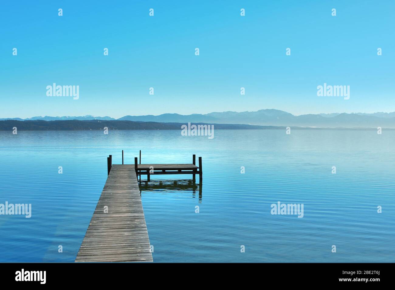 A Photograph of a blue lake at a bright day Stock Photo - Alamy
