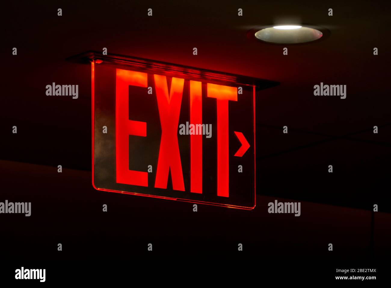 Illuminated exit signs hi-res stock photography and images - Alamy