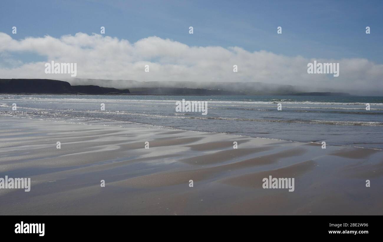 Where a river meets the sea. The tidal shift of water moving around the ...
