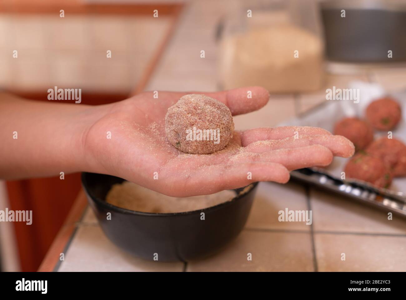 raw beef meatball on the hand Stock Photo - Alamy