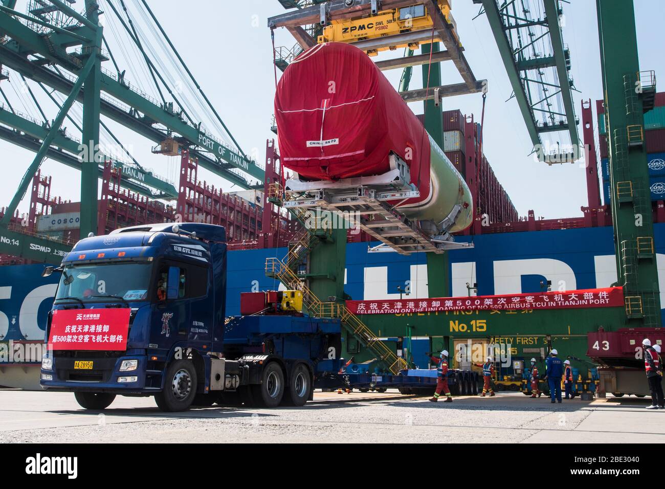 Tianjin. 11th Apr, 2020. Workers unload Airbus aircraft component at ...